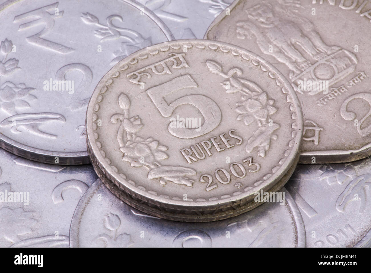 Detail of different India Rupees coins on the table Stock Photo - Alamy