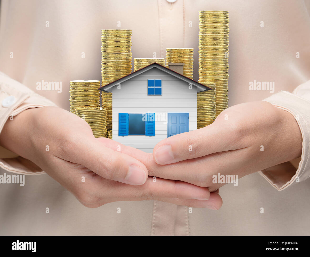 ownership concept with hand holding house model Stock Photo - Alamy