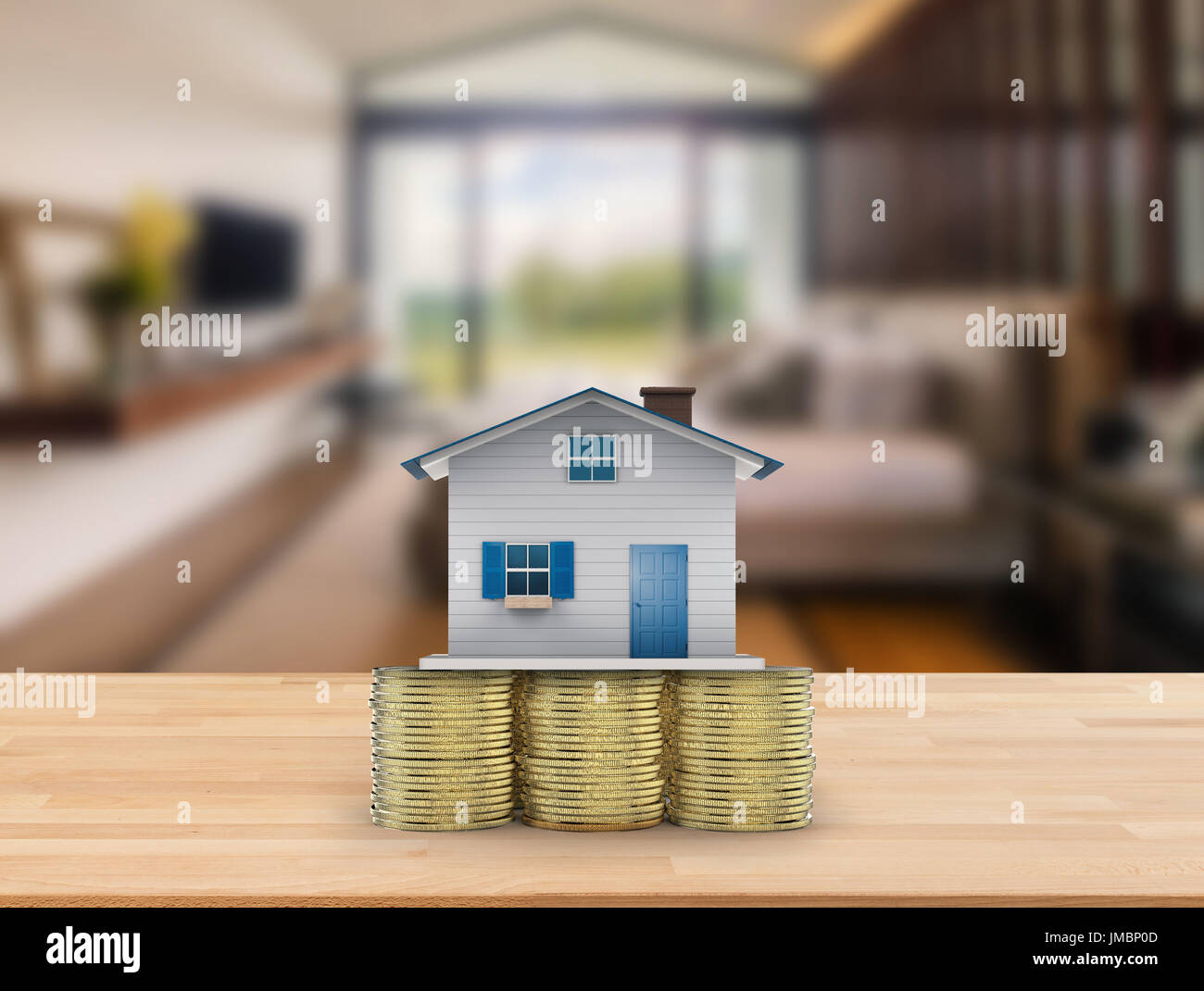 real estate investment concept with mock up houses and gold coins Stock ...