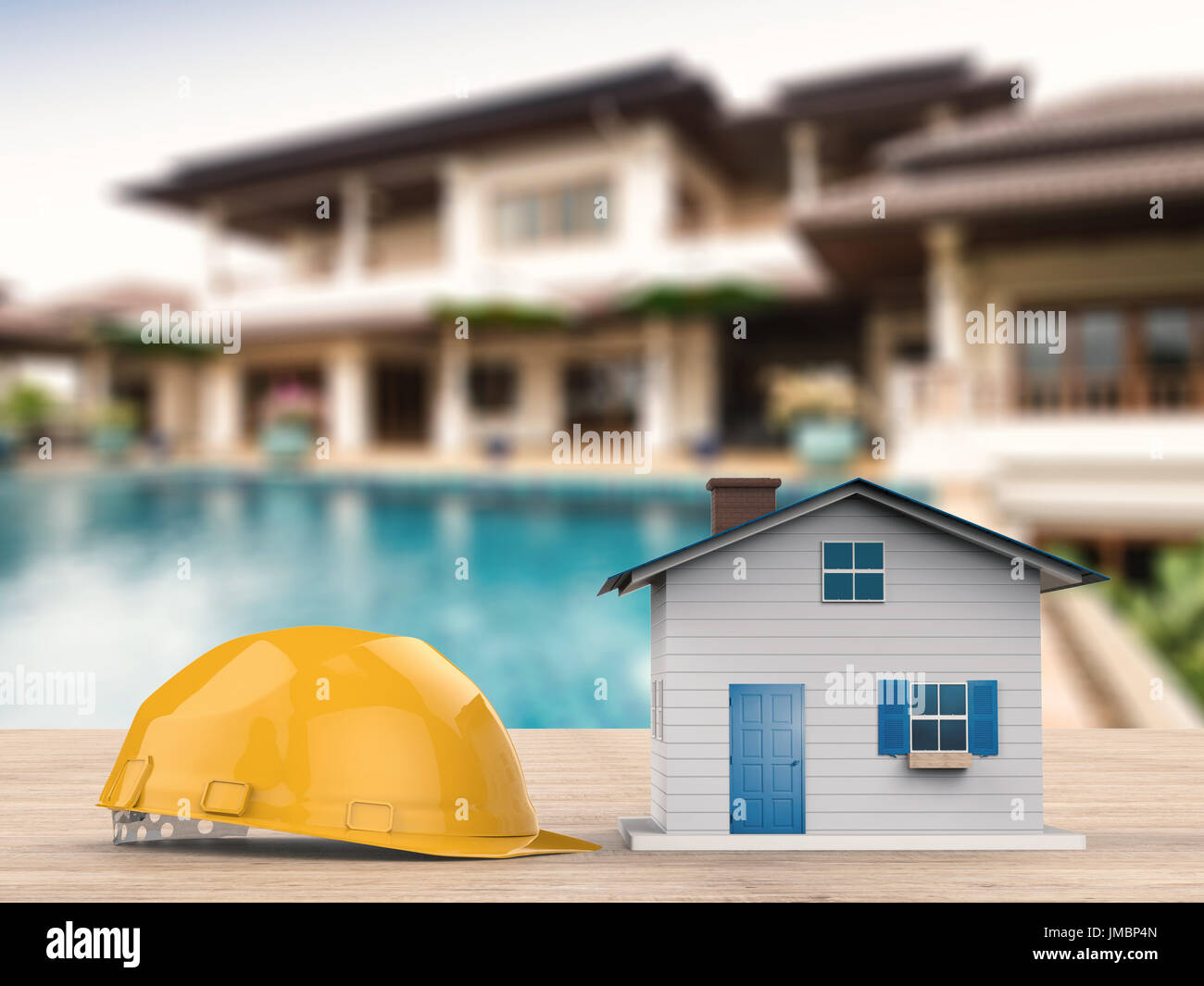 house building concept with mock up house model with safety helmet ...