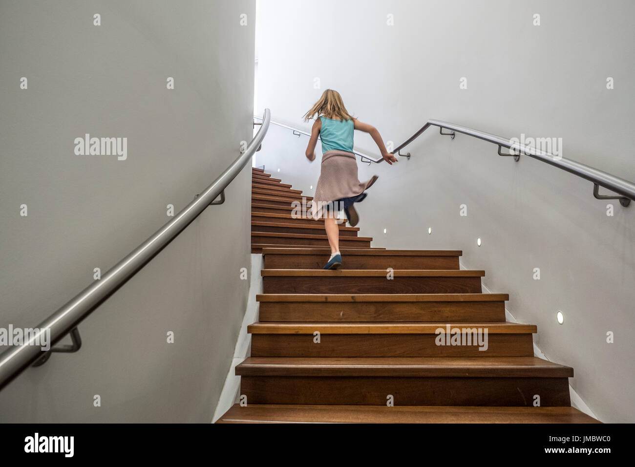 Woman Running Stairs