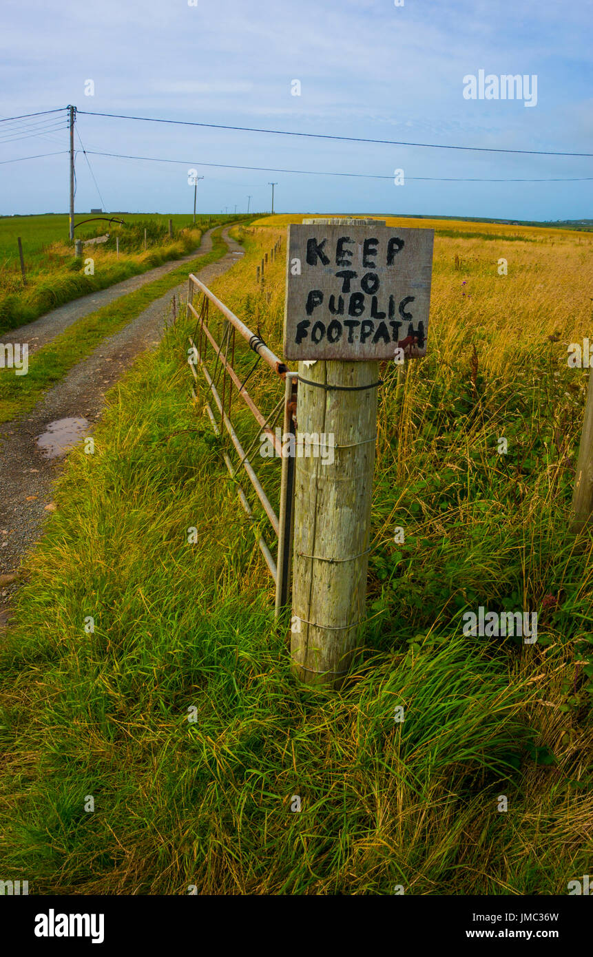 Portrait of handwritten wooden Keep to Public Footpath sign in country ...
