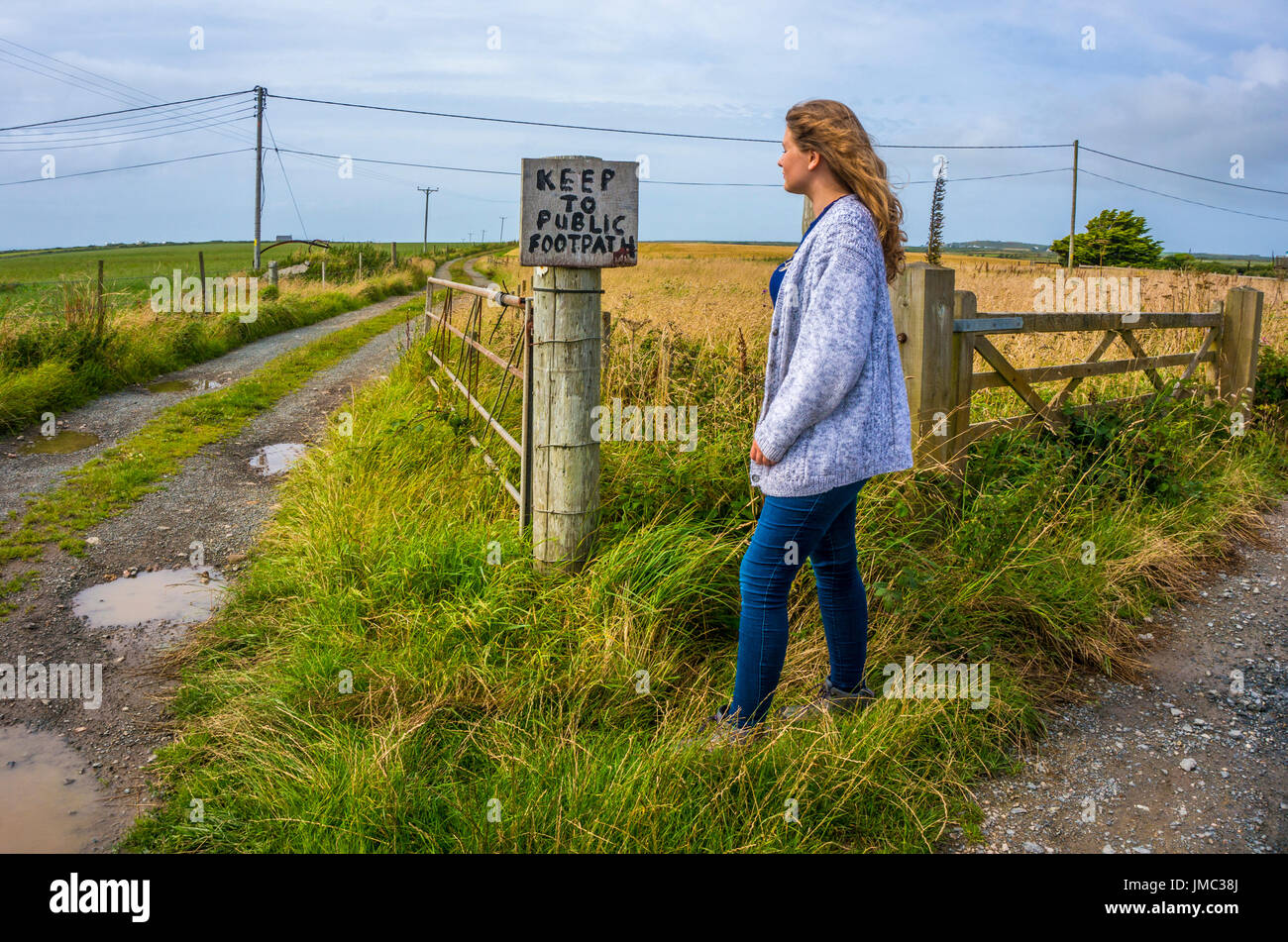 Woman walking next black hi-res stock photography and images - Alamy