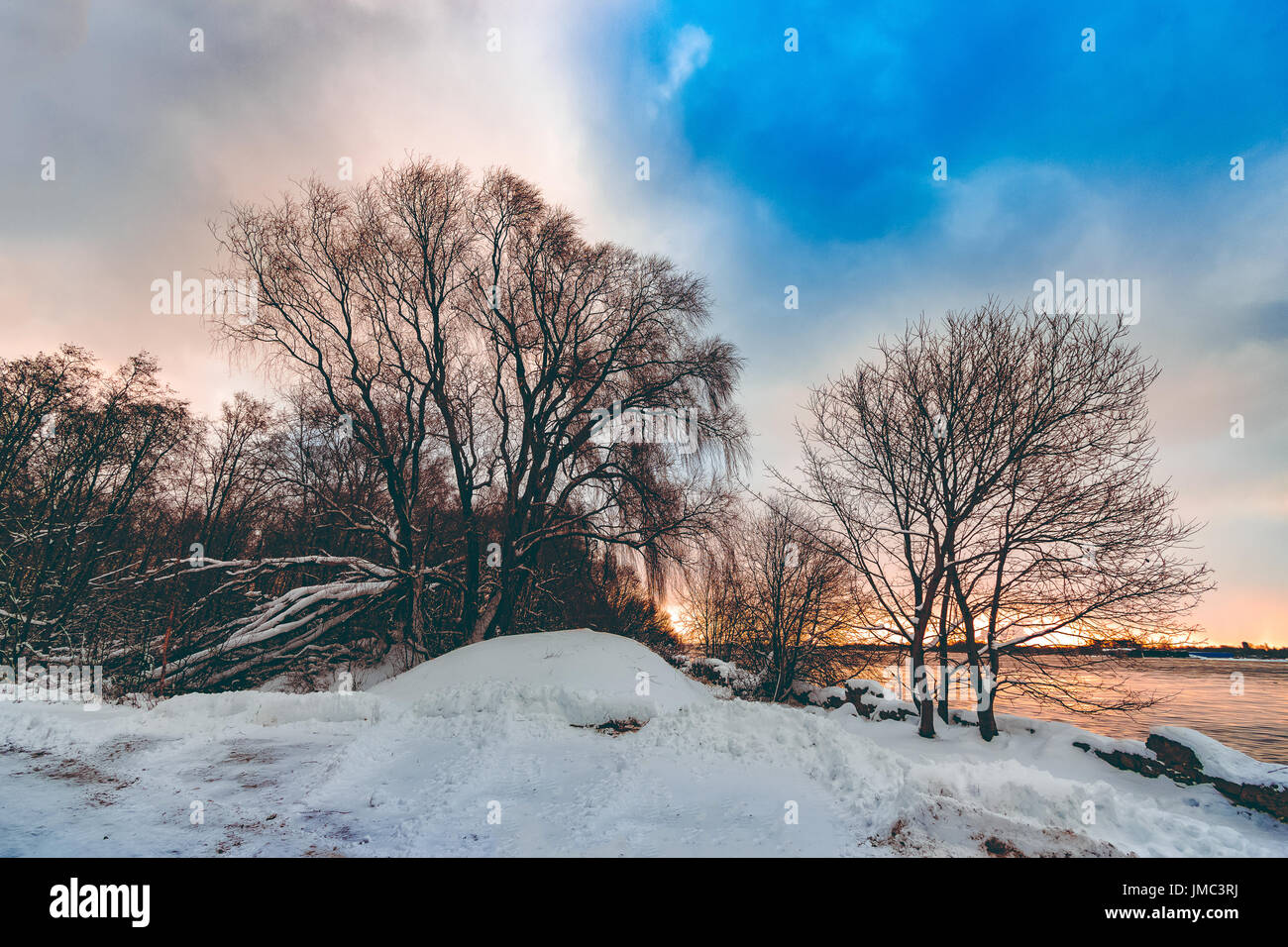 Cold winter snowy landscape at middle of the day Stock Photo - Alamy