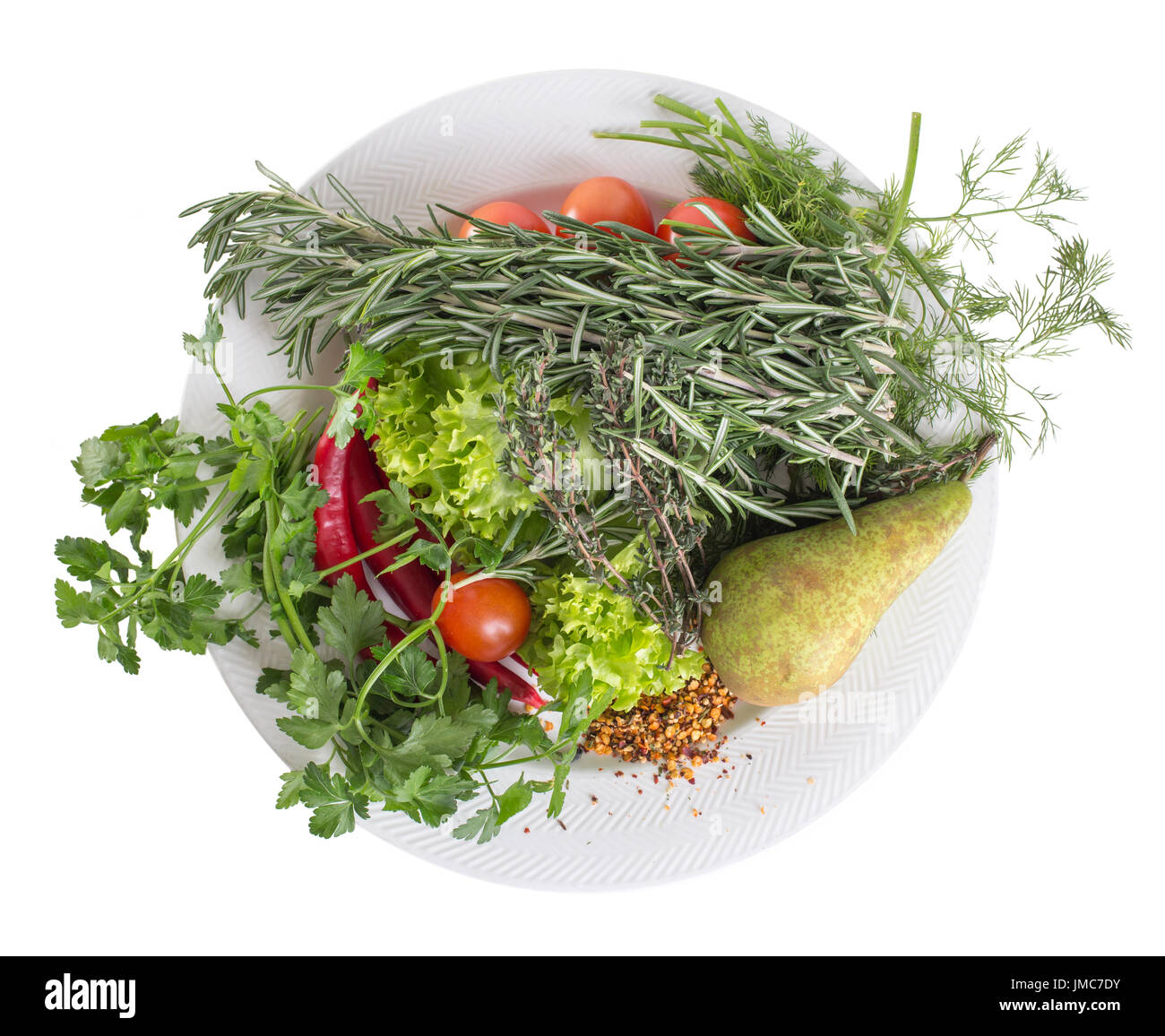 Plate of herbs and vegetables. Isolated on a white background Stock ...