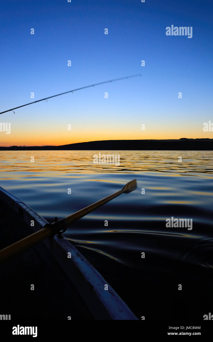 Fishing rod water rowing boat hi-res stock photography and images - Alamy