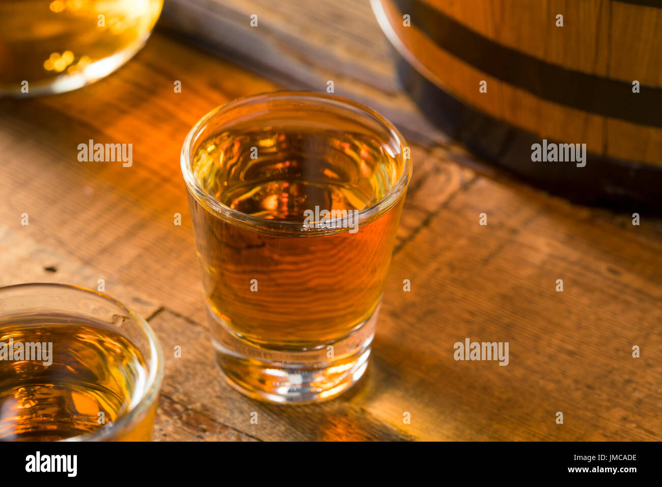 Alcoholic Brown Rum in a Shot Glass Ready to Drink Stock Photo - Alamy