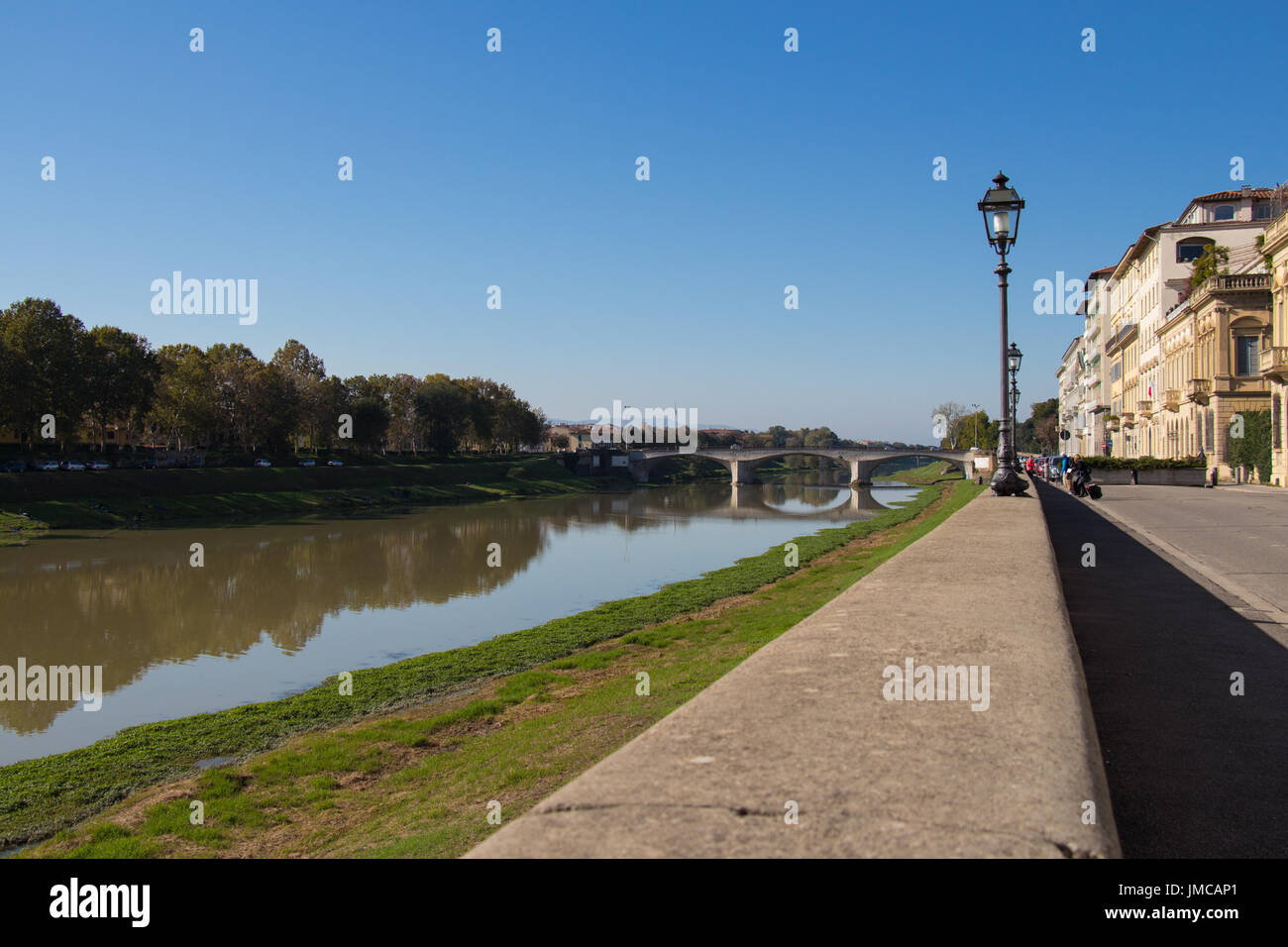 The view of Arno river embankment in a sunny day. Florence. Italy Stock ...
