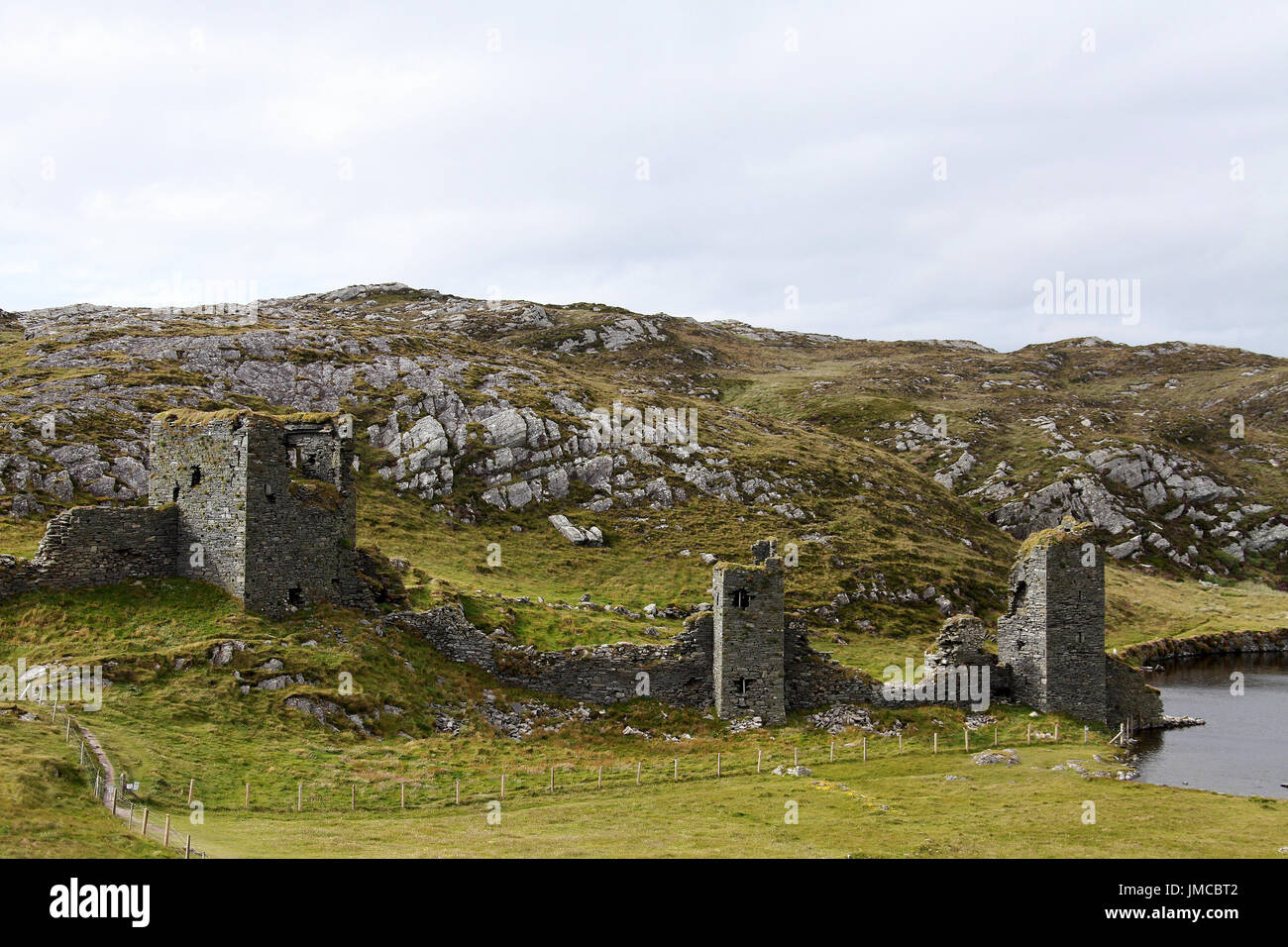 Dunlough Castle standing on the isthmus connecting Three Castle Head ...