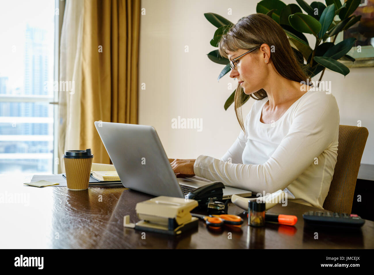 Woman working home typing hi-res stock photography and images - Alamy