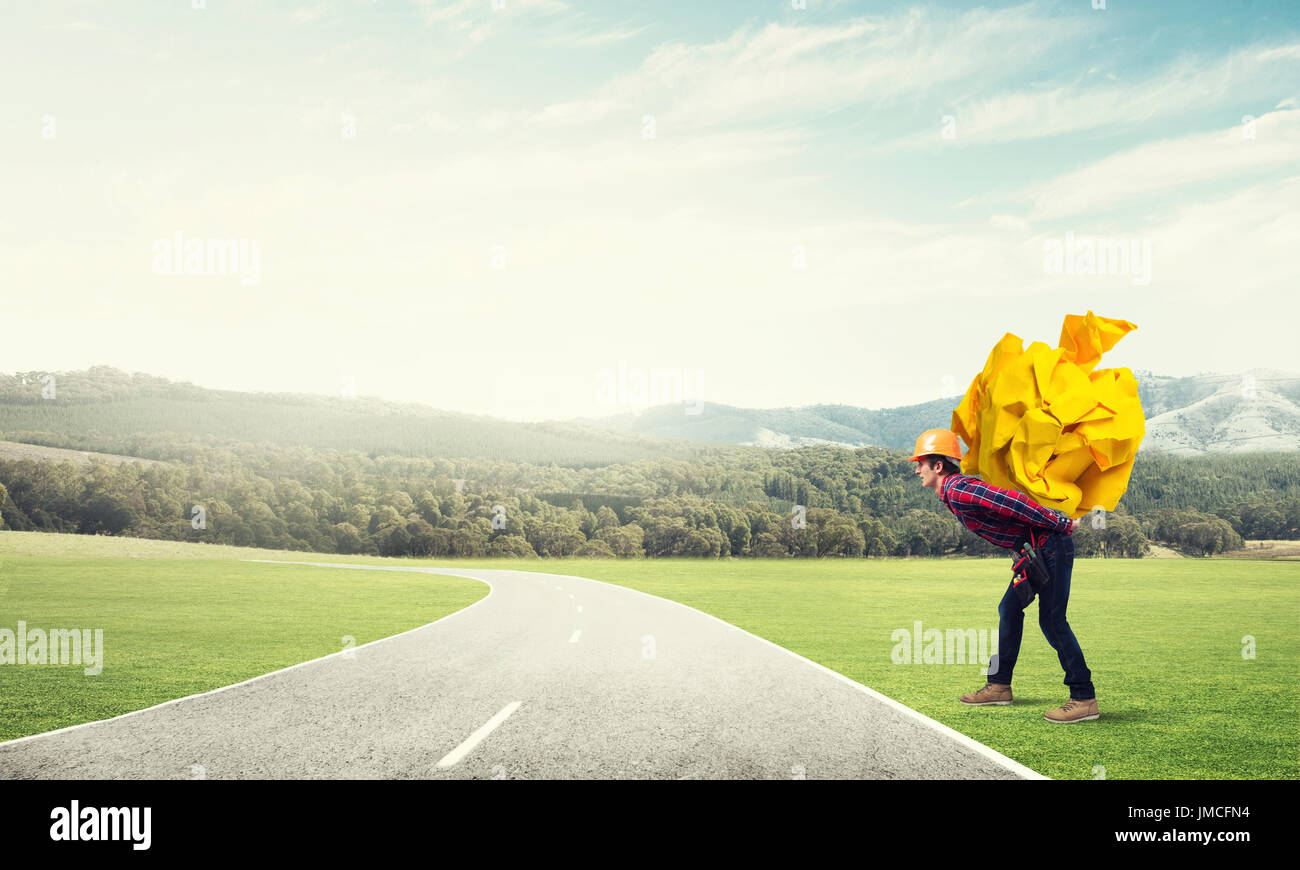 Engineer man carry load Stock Photo - Alamy