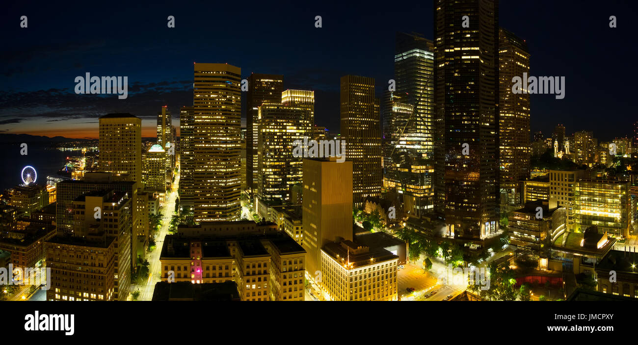 Seattle night aerial panorama of downtown high rises and waterfront ...