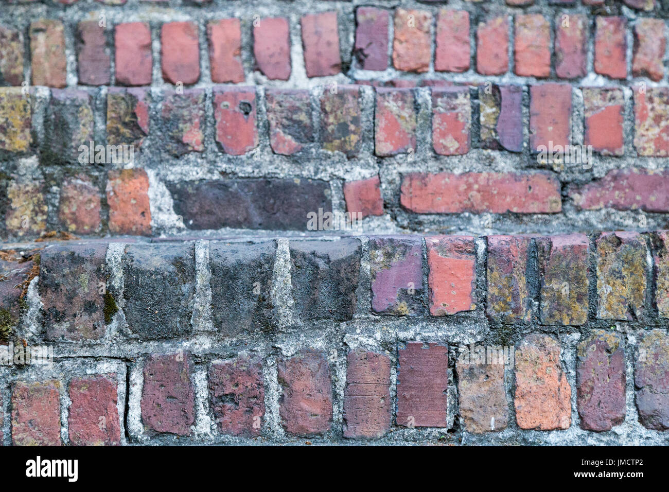 Brick stone wall with cracks hi-res stock photography and images - Alamy