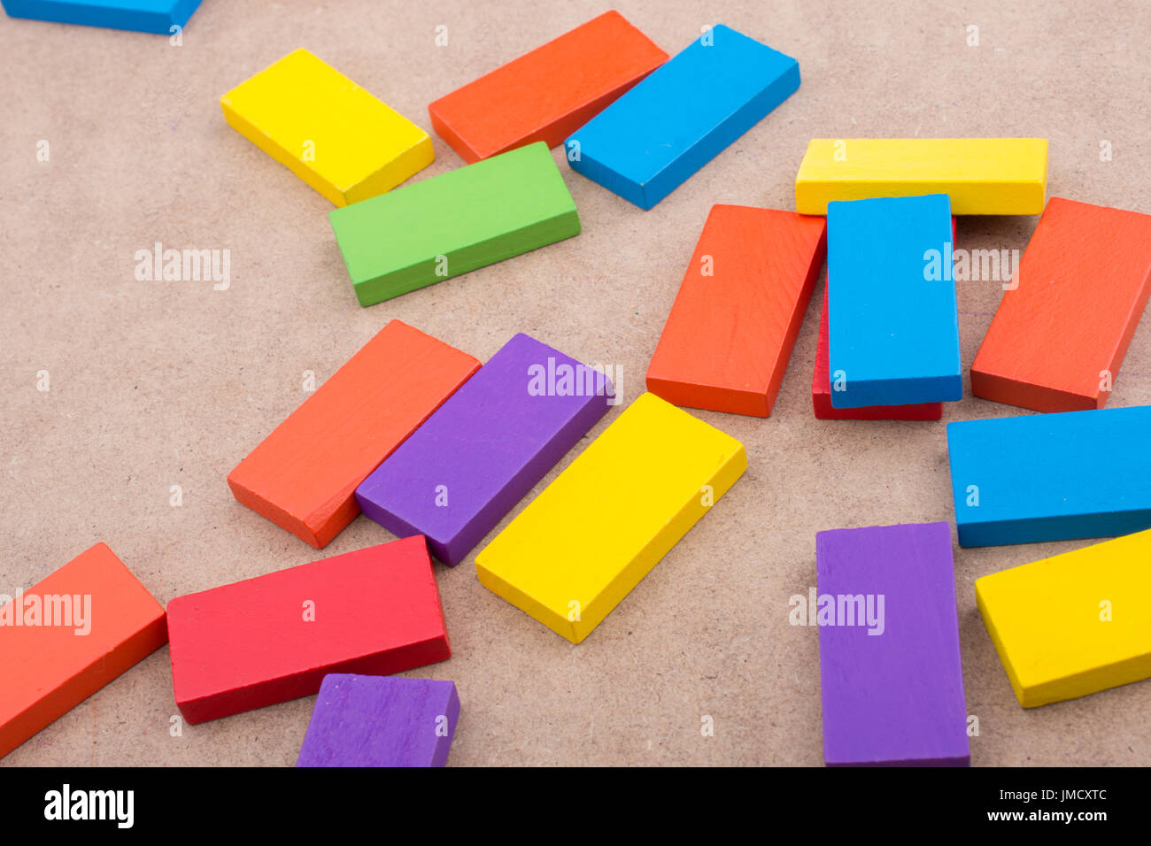 Wooden blocks of various color randomly scattered Stock Photo - Alamy