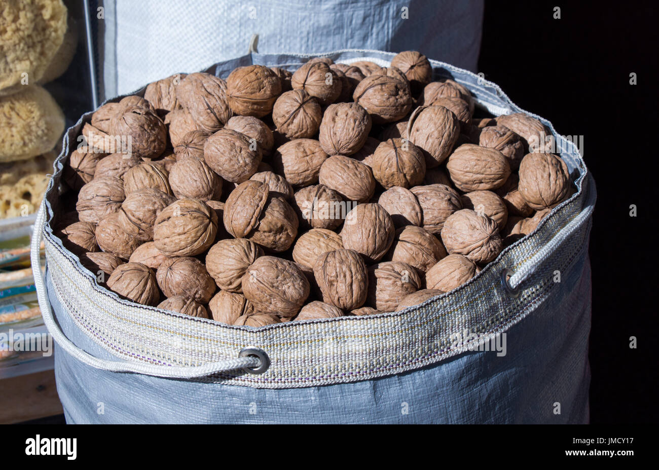 Pile of whole fresh walnuts with hard nutshells Stock Photo - Alamy