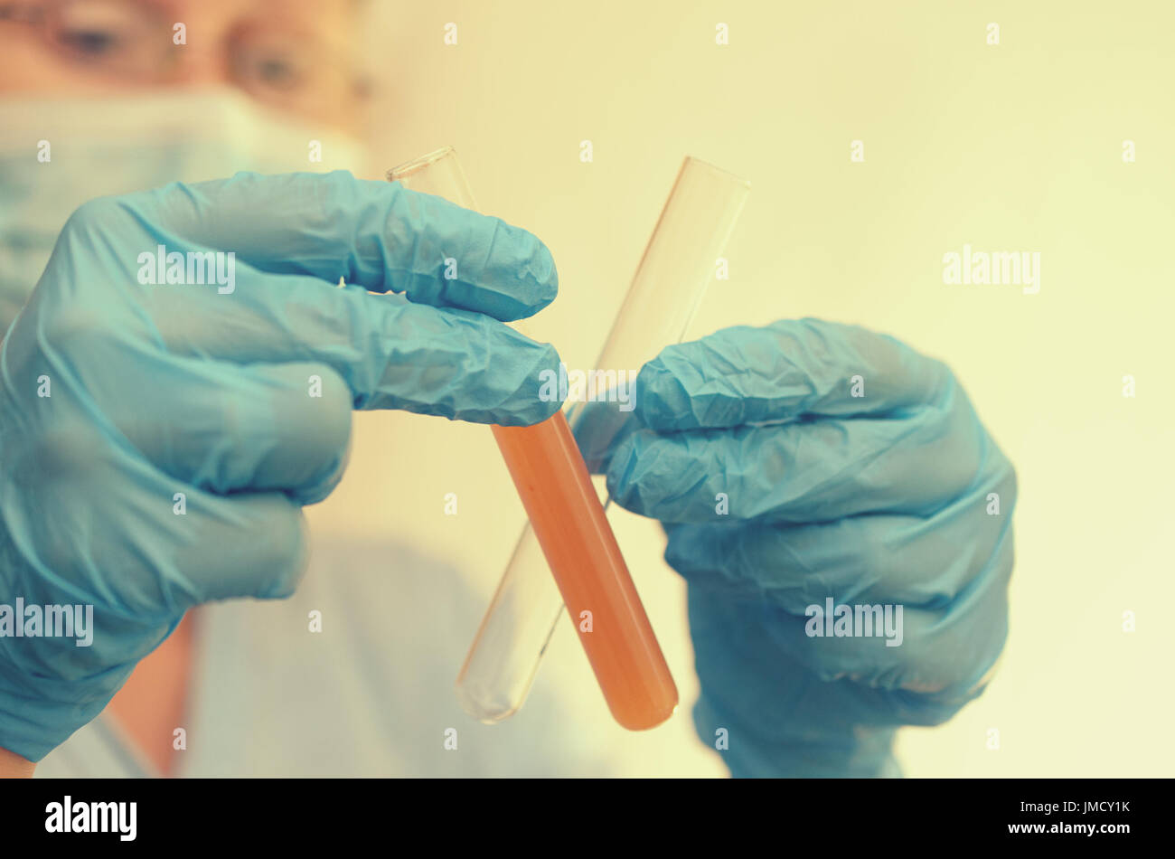 Doctor makes tests hi-res stock photography and images - Alamy