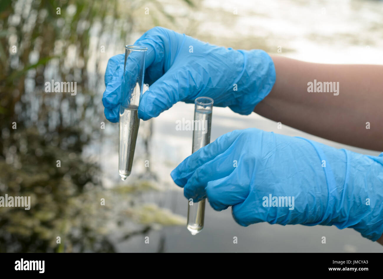 Taking a water test for analysis from a reservoir Stock Photo - Alamy