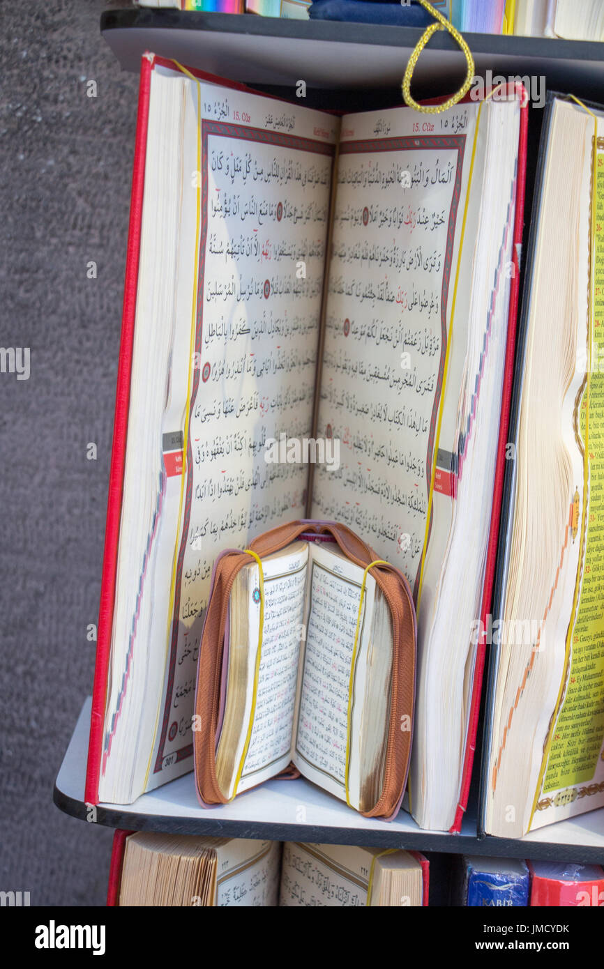 Islamic Holy Book Quran on the market shelf Stock Photo - Alamy