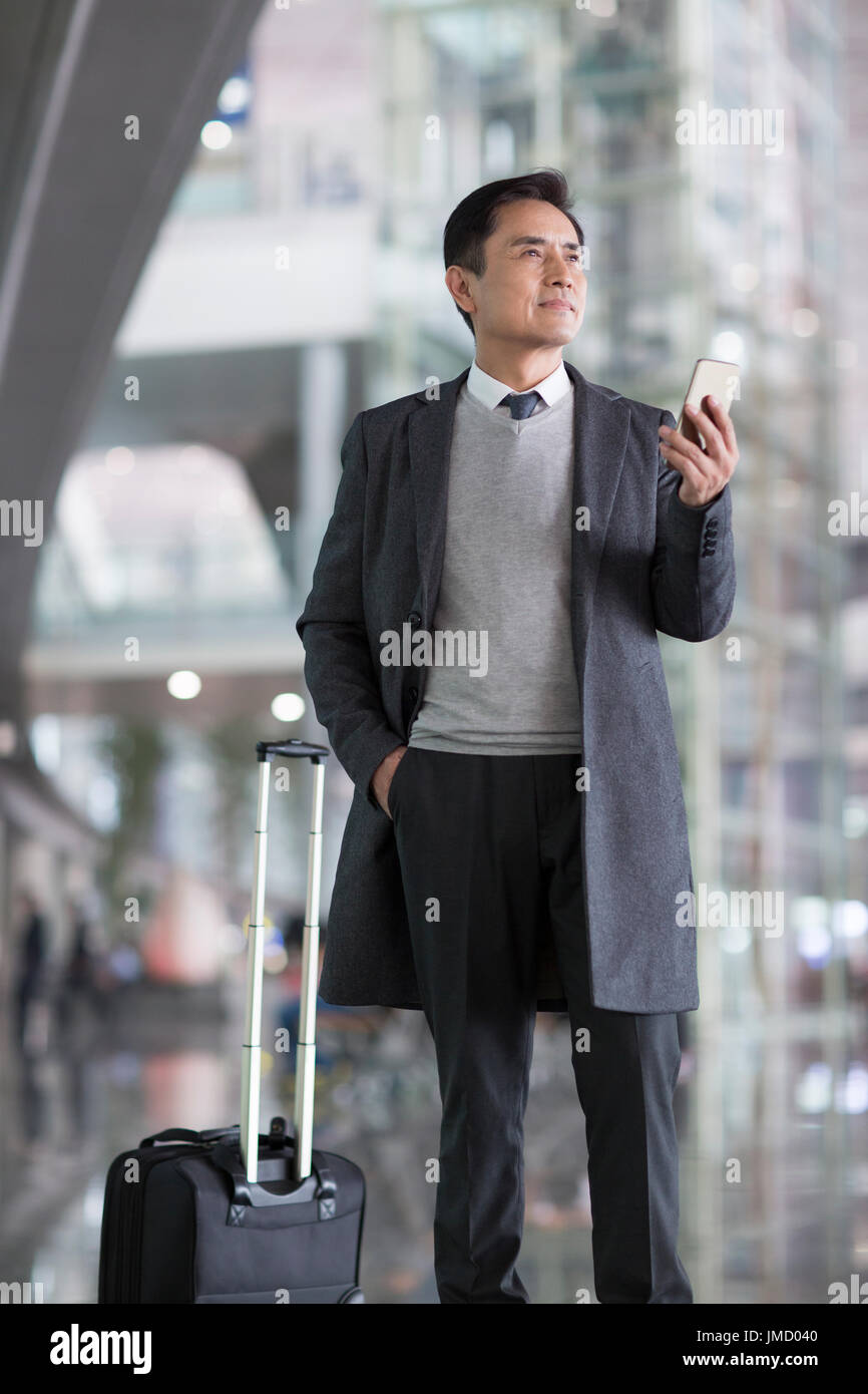 Chinese businessman standing hands hi-res stock photography and images ...