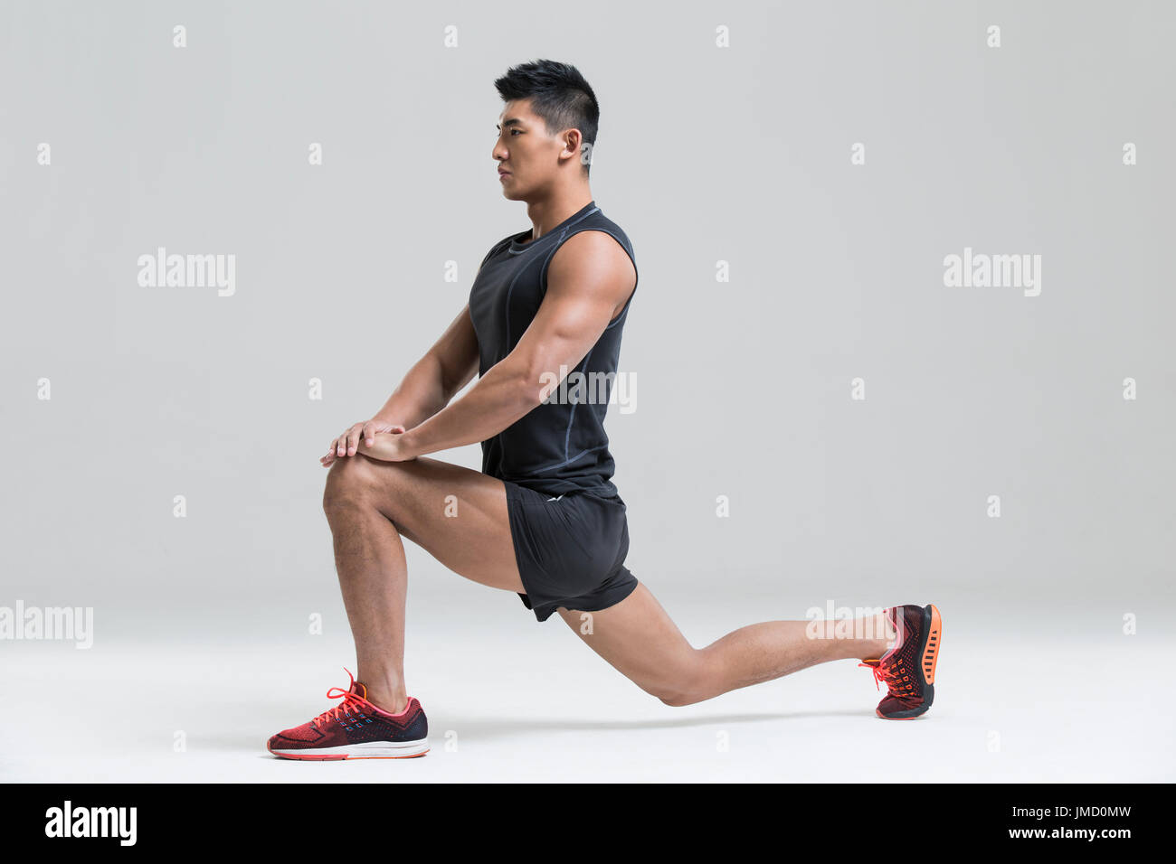 Young Chinese man exercising Stock Photo - Alamy