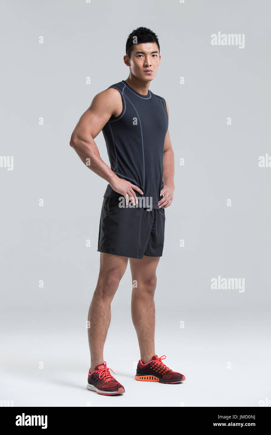Portrait of male Chinese athlete Stock Photo - Alamy