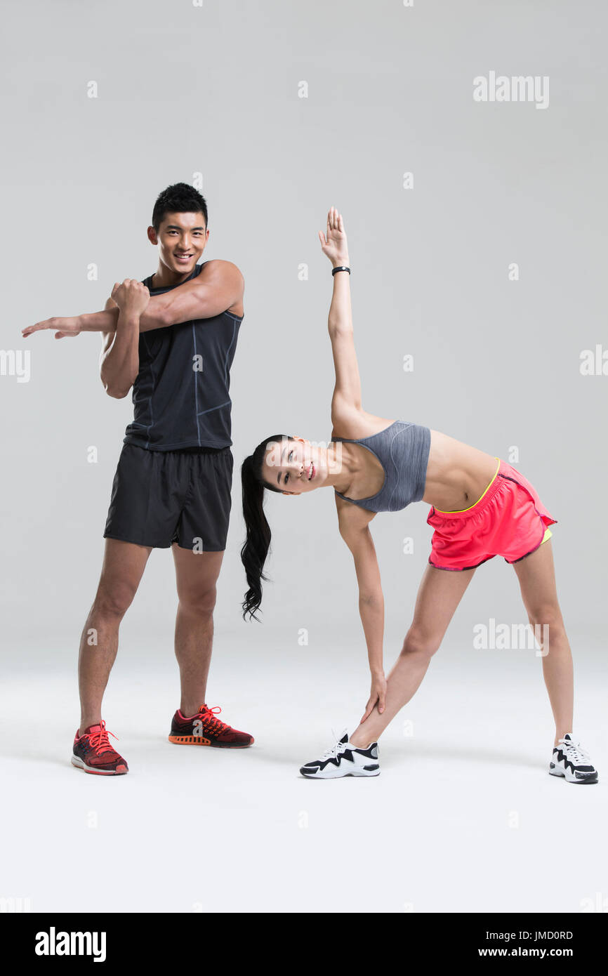 Young Chinese couple exercising Stock Photo - Alamy