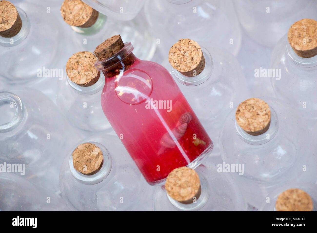 Set of Empty small transparent bottles in a box Stock Photo - Alamy