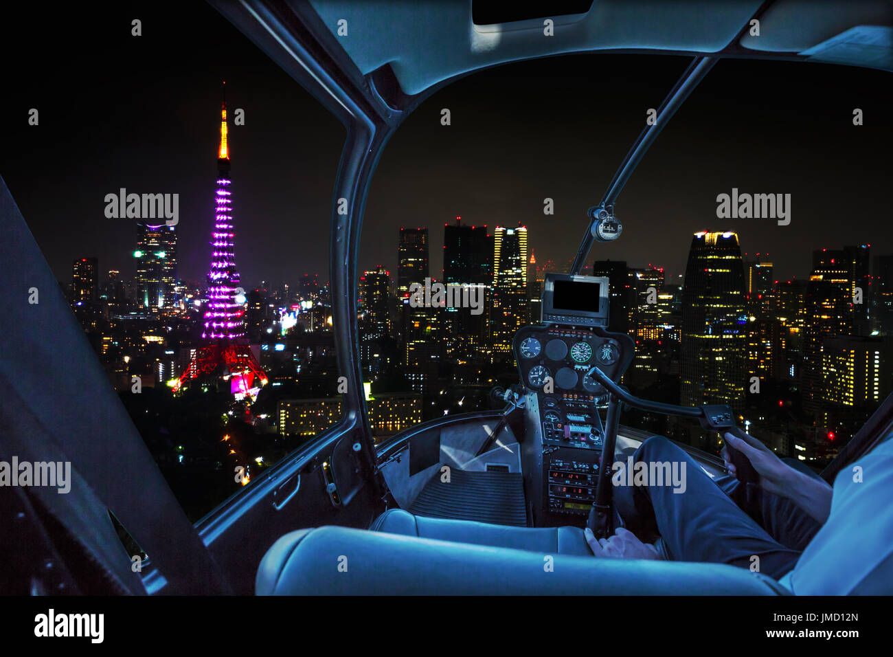 Helicopter in Tokyo cityscape Stock Photo - Alamy