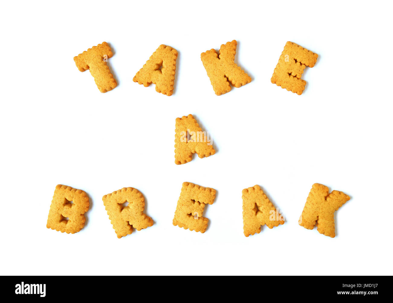 The word TAKE A BREAK spelled with alphabet shaped biscuits on white ...