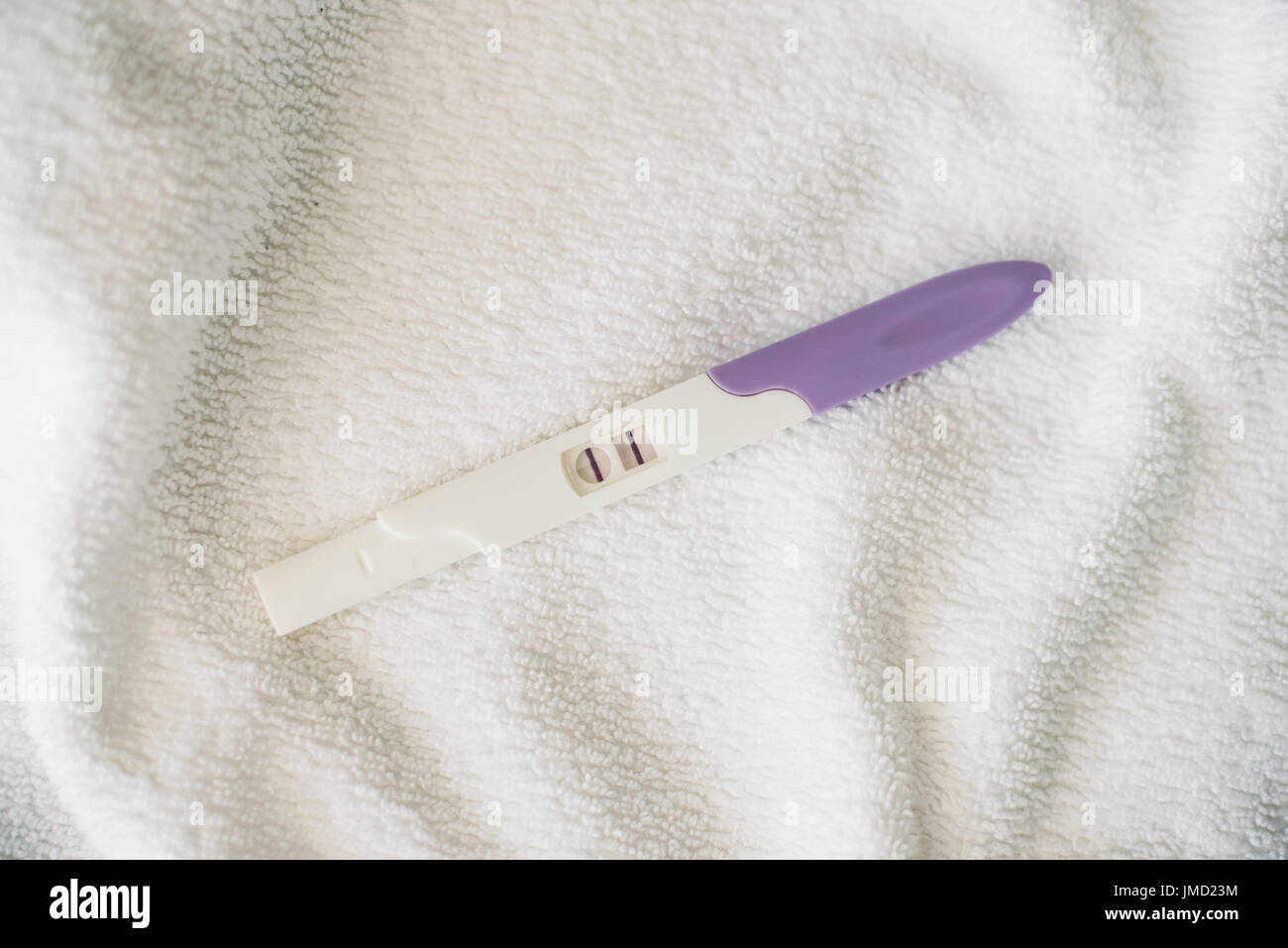 Positive pregnancy test Stock Photo - Alamy