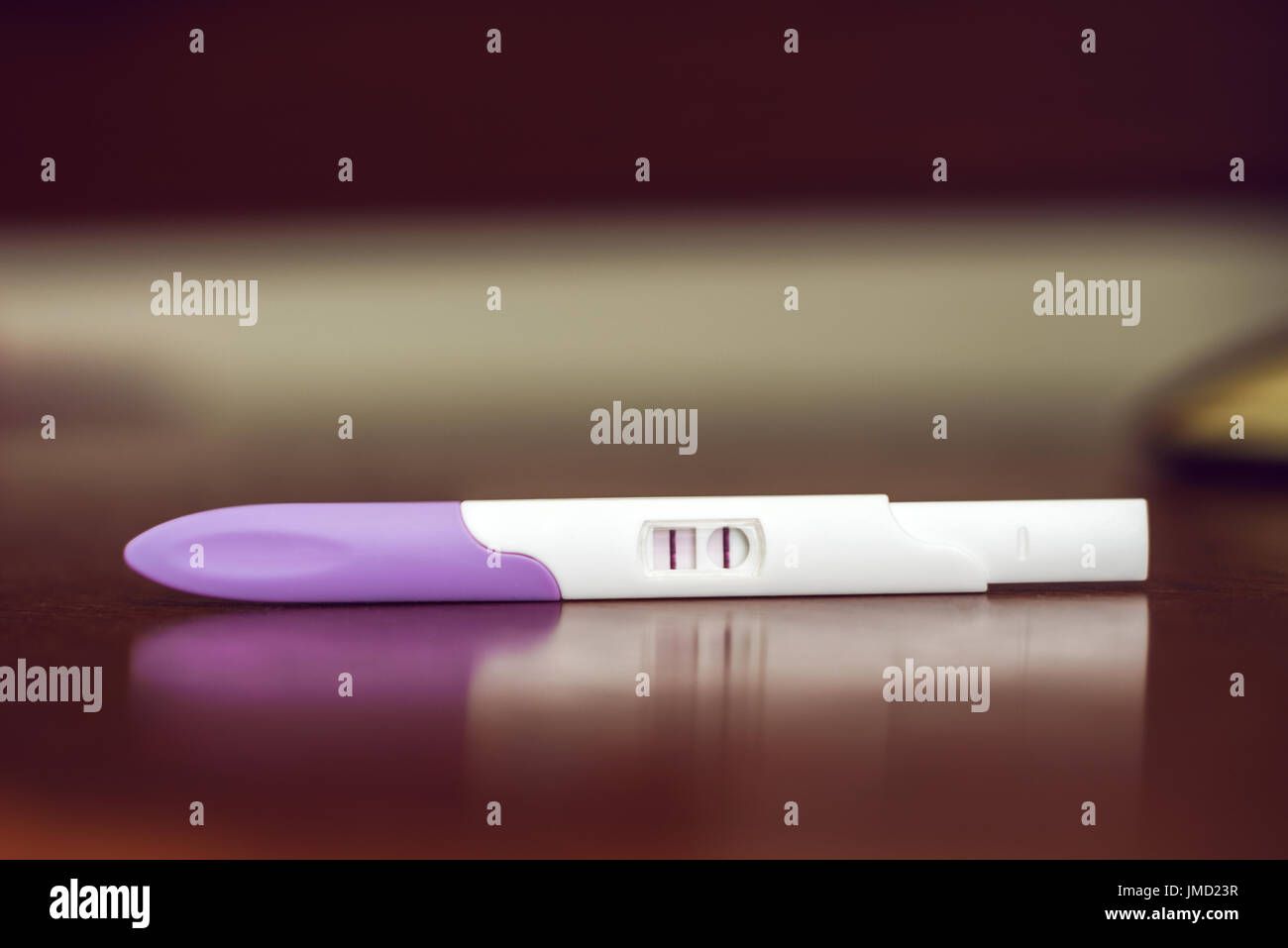 Positive pregnancy test Stock Photo - Alamy