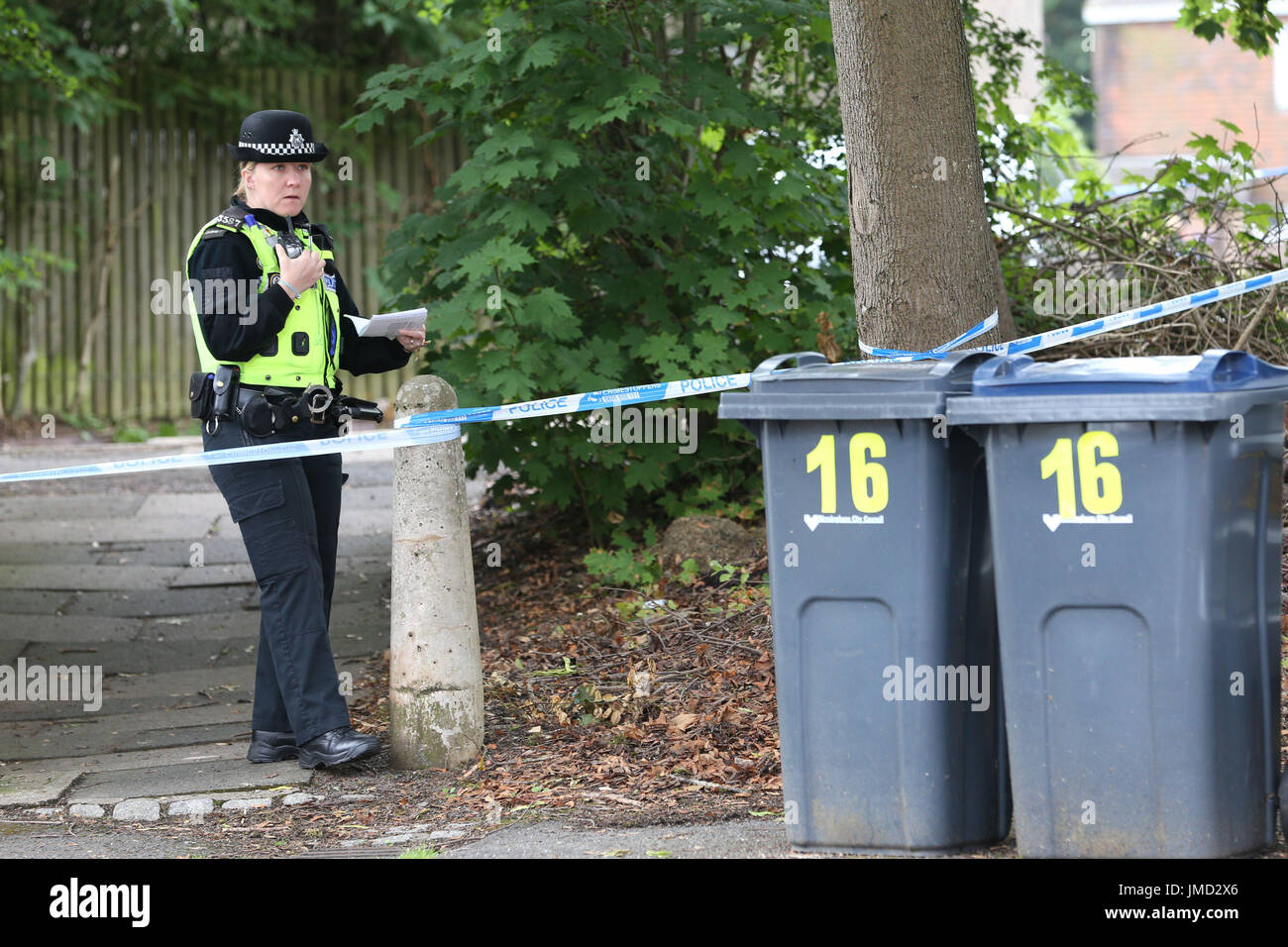 Police At The Scene Where Armed Officers Have Shot A Man And Another