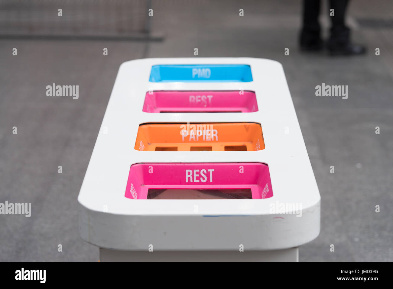 waste bin in several colors at the antwerp central station Stock Photo ...