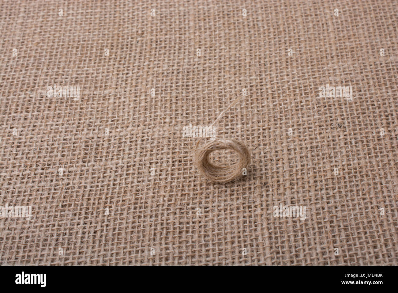 Roll of brown color linen string paper background Stock Photo - Alamy