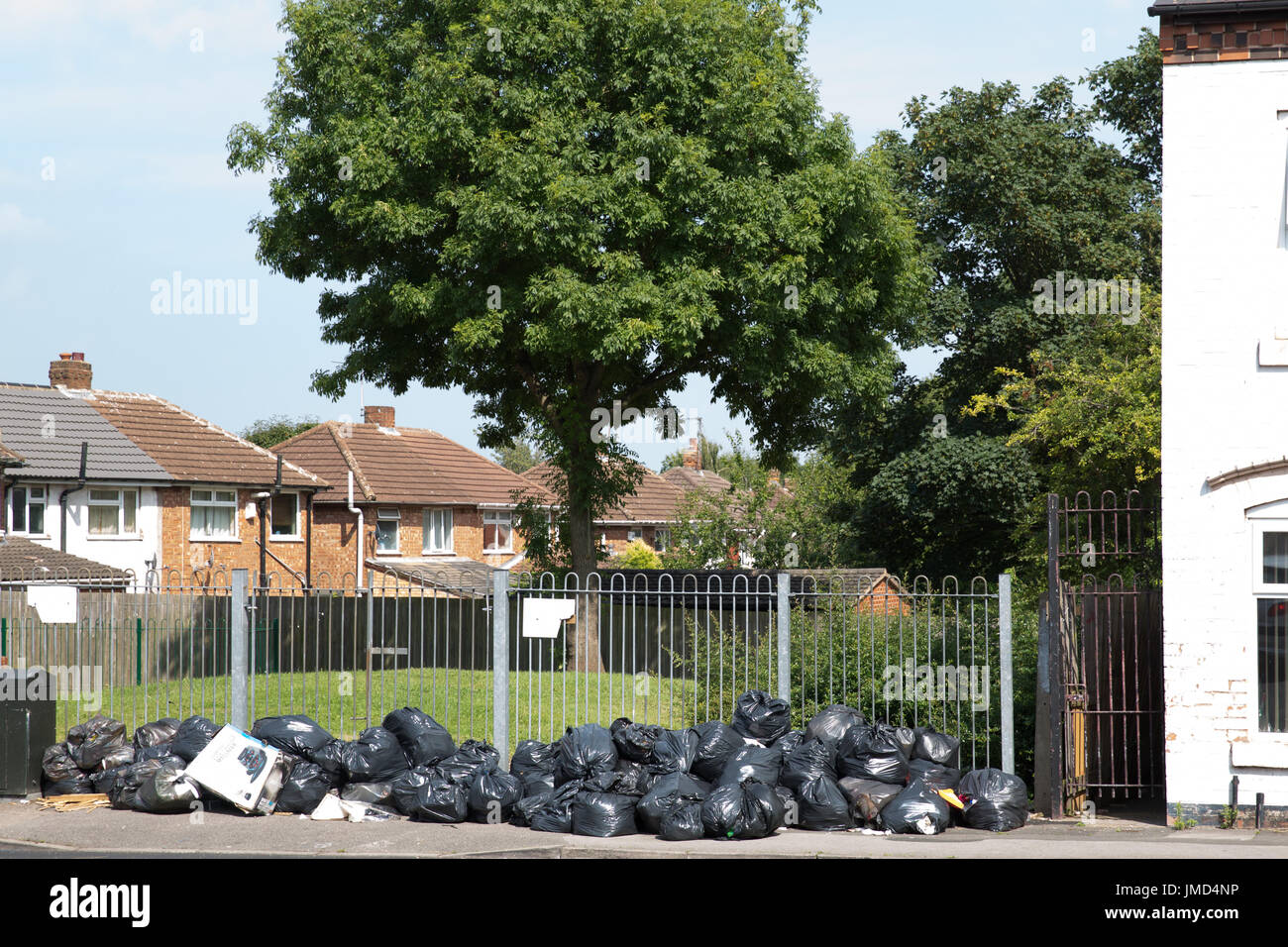Piles of uncollected rubbish in Tarry Road, Alum Rock, Birmingham. The ...