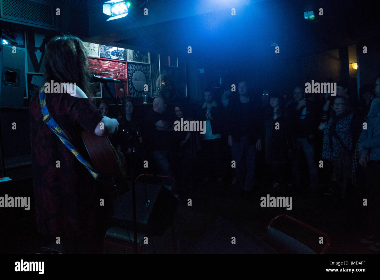 Famous musicians, guitarists, band from behind with stage lights Stock ...