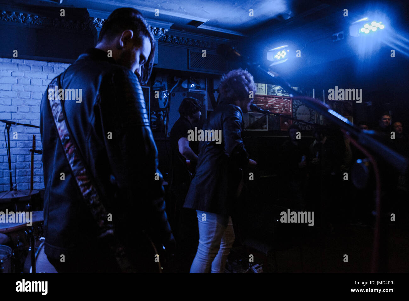 Famous musicians, guitarists, band from behind with stage lights Stock ...