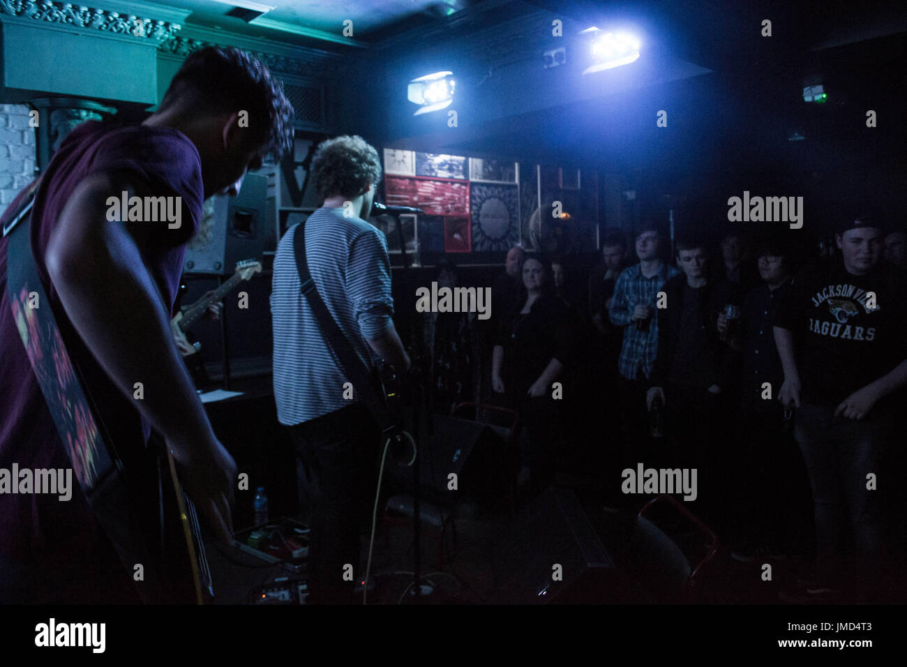 Famous musicians, guitarists, band from behind with stage lights Stock ...