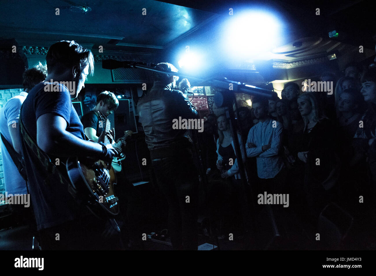 Famous musicians, guitarists, band from behind with stage lights Stock ...