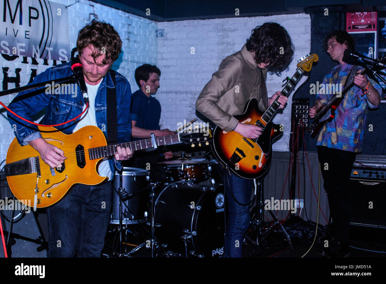 Band performing in underground venue Stock Photo - Alamy