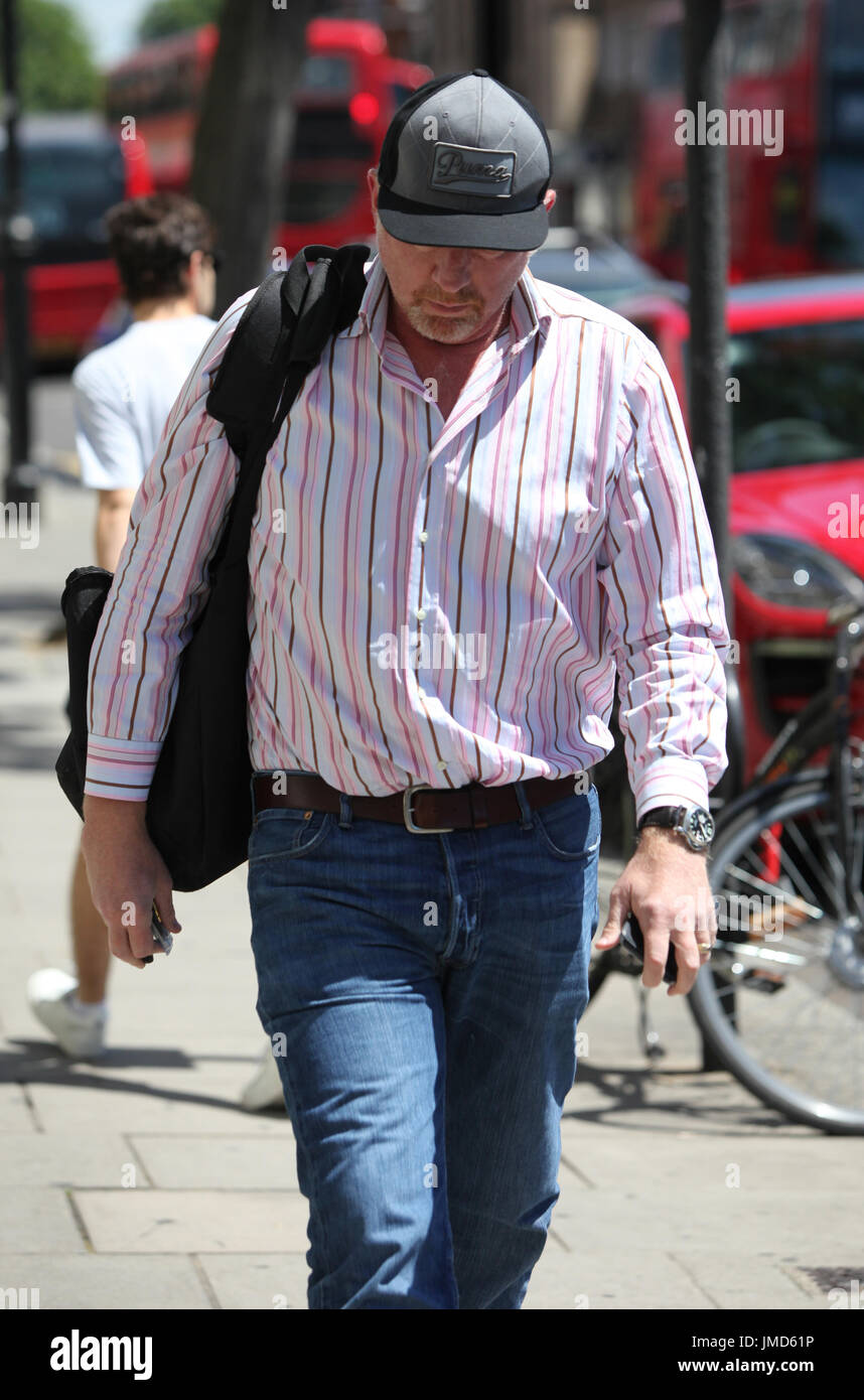 Boris Becker removing a ticket from his car in Kensington, West London ...