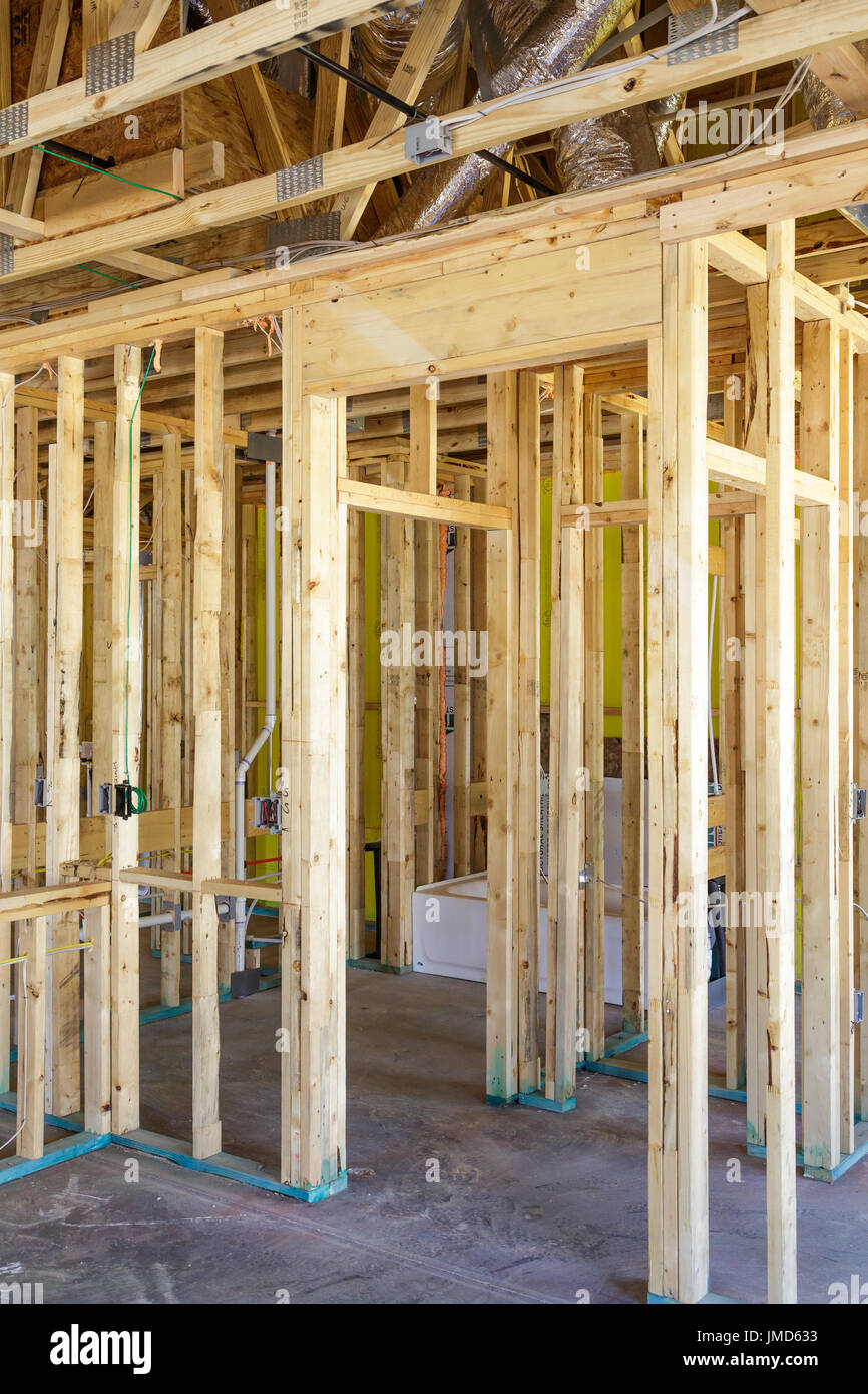 New Pine Studs in New Home Construction Stock Photo - Alamy