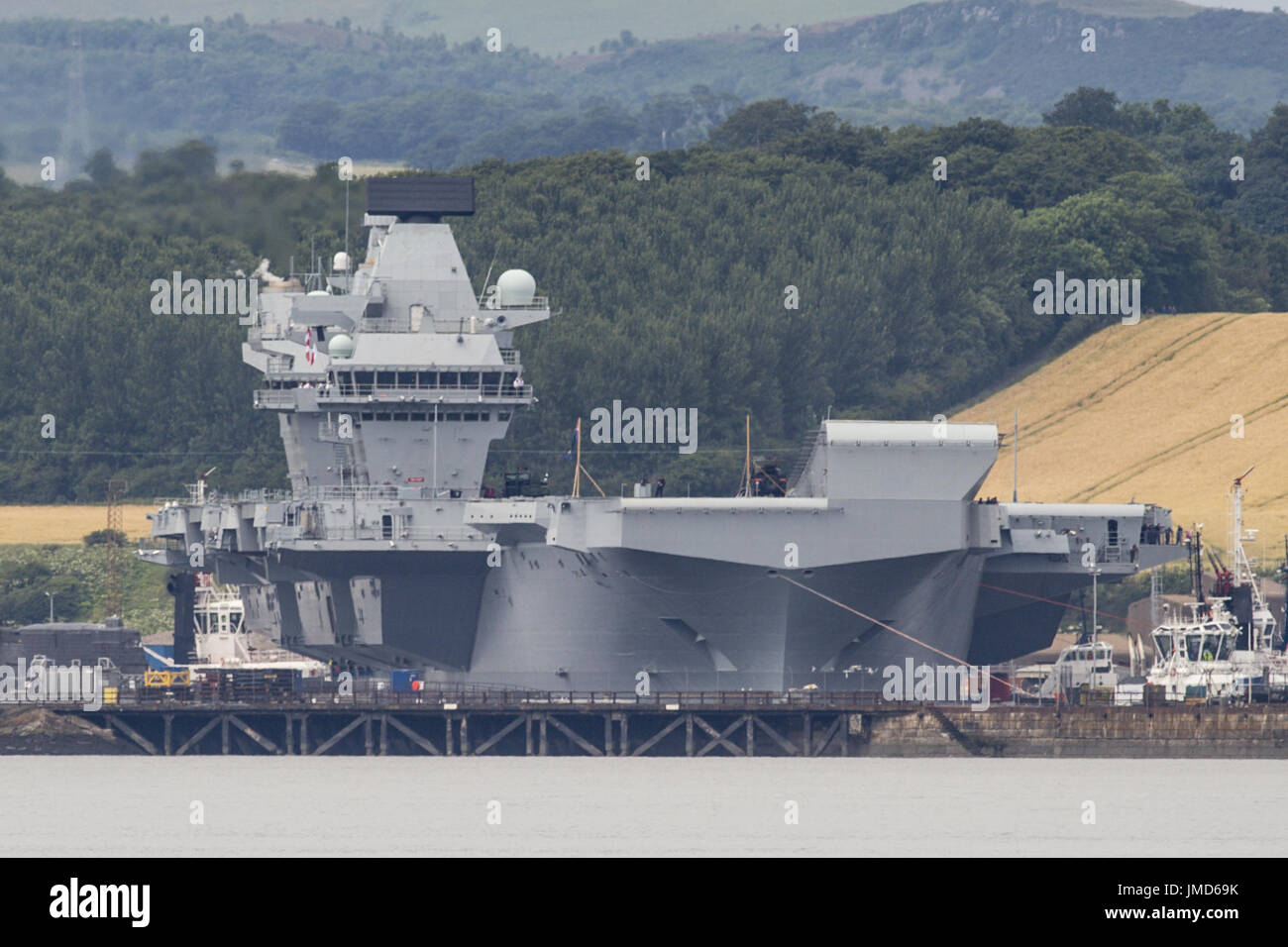 The HMS Queen Elizabeth turns in Rosyth Docks as it is due to set sail ...