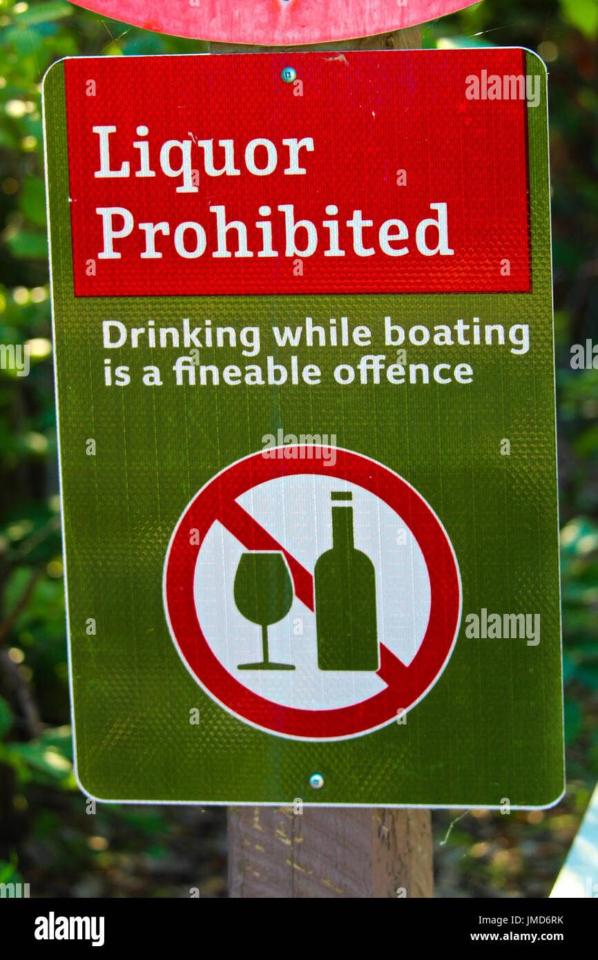 A liquor prohibited, drinking while boating is an offense sign Stock ...
