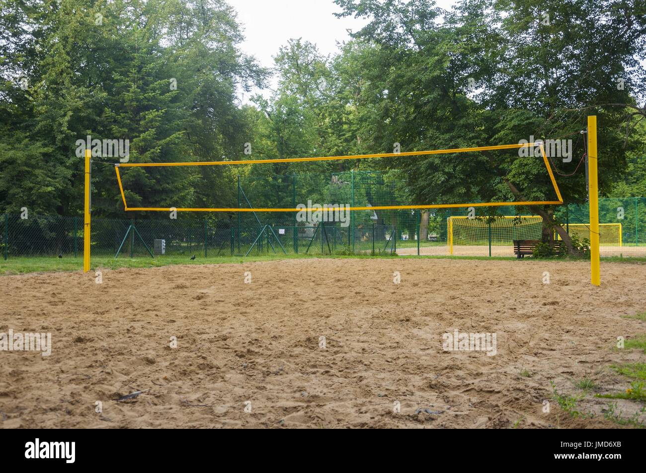 a volleyball net hang over the sand field Stock Photo - Alamy