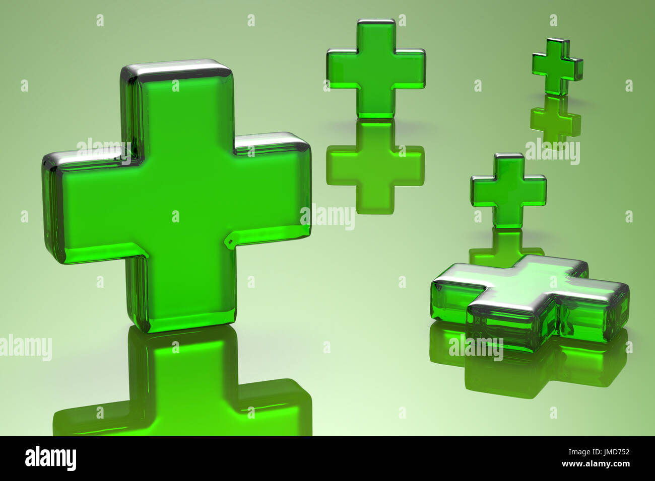 safety first aid with green cross on green background Stock Photo - Alamy