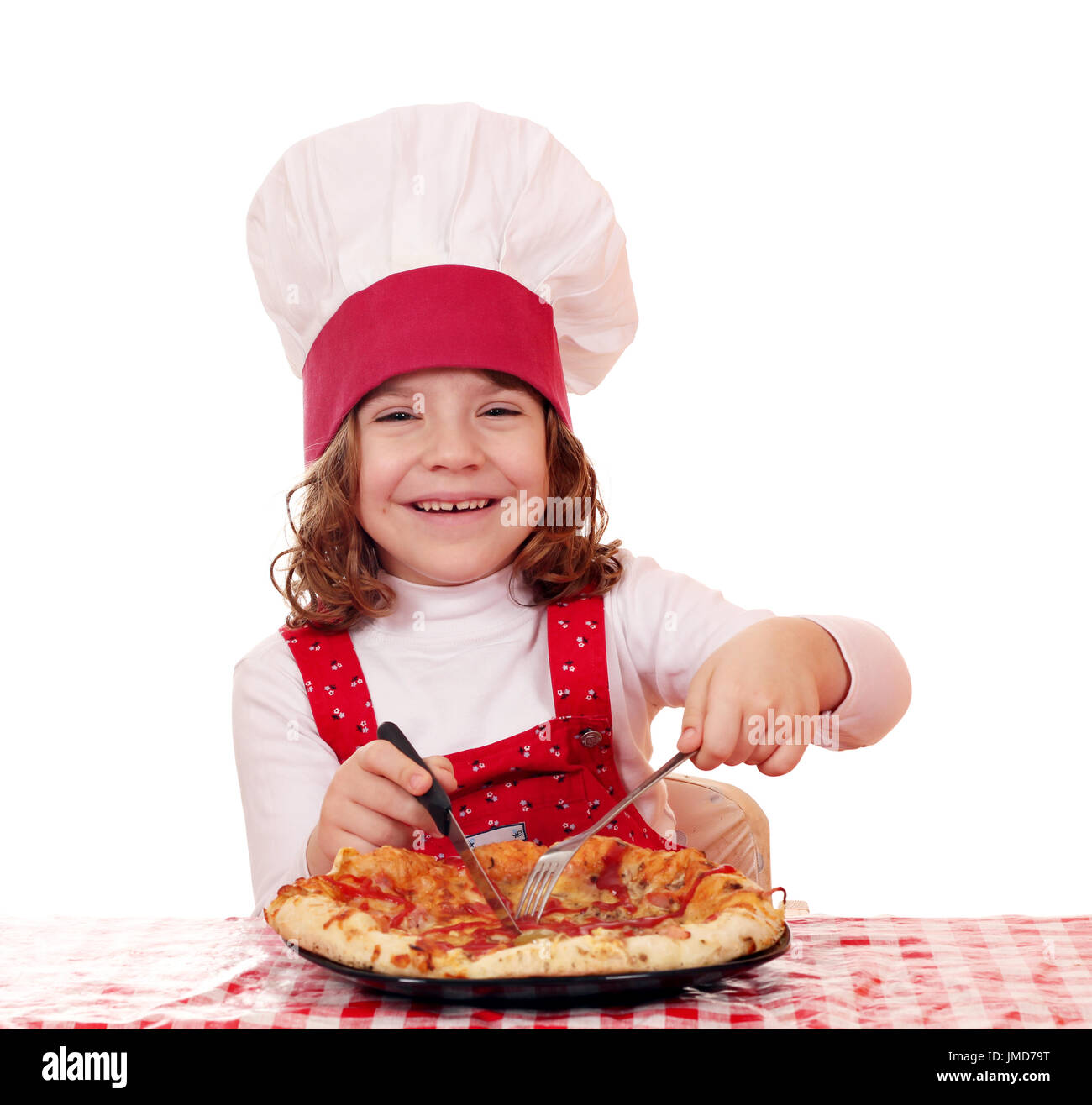 little girl cook eating pizza Stock Photo - Alamy