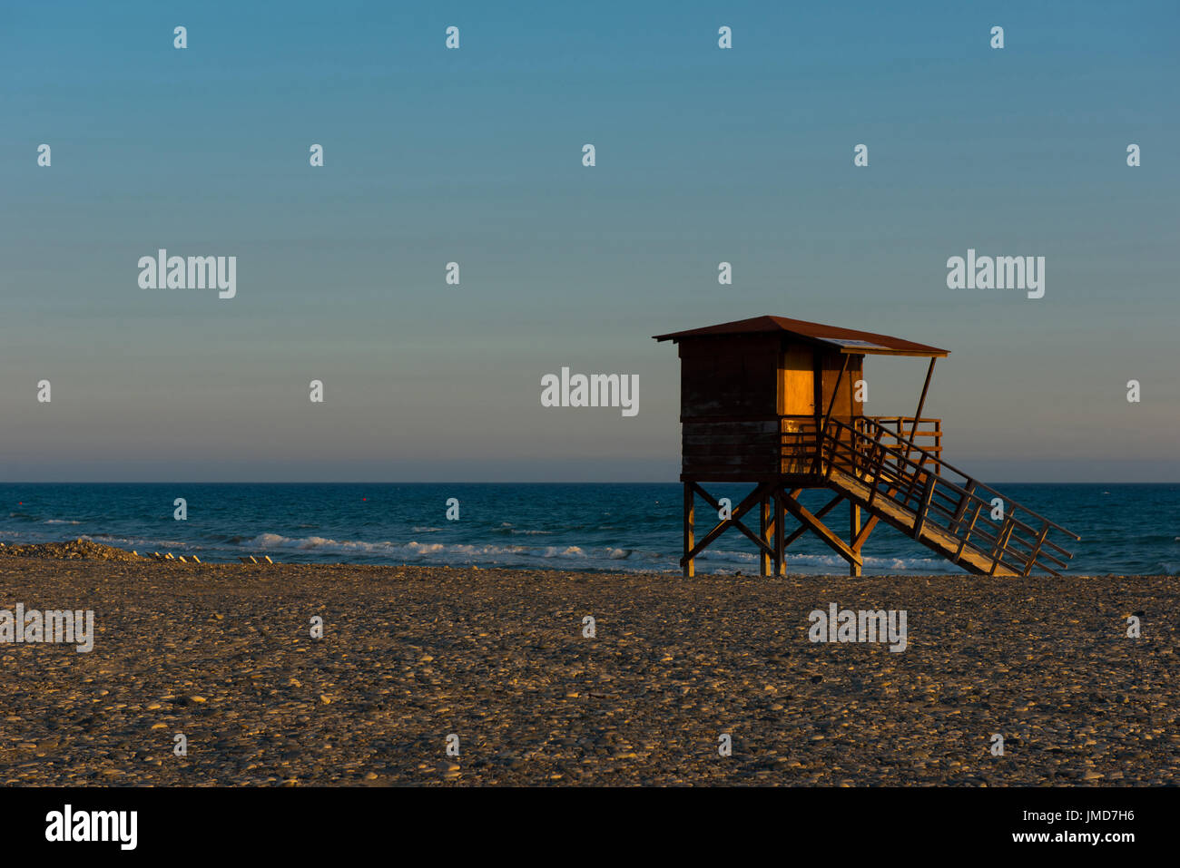 Baywatch tower on the beach. Lifeguard tower in the sunset Stock Photo ...