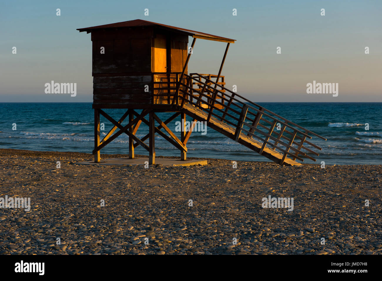 Baywatch tower on the beach. Lifeguard tower in the sunset Stock Photo ...