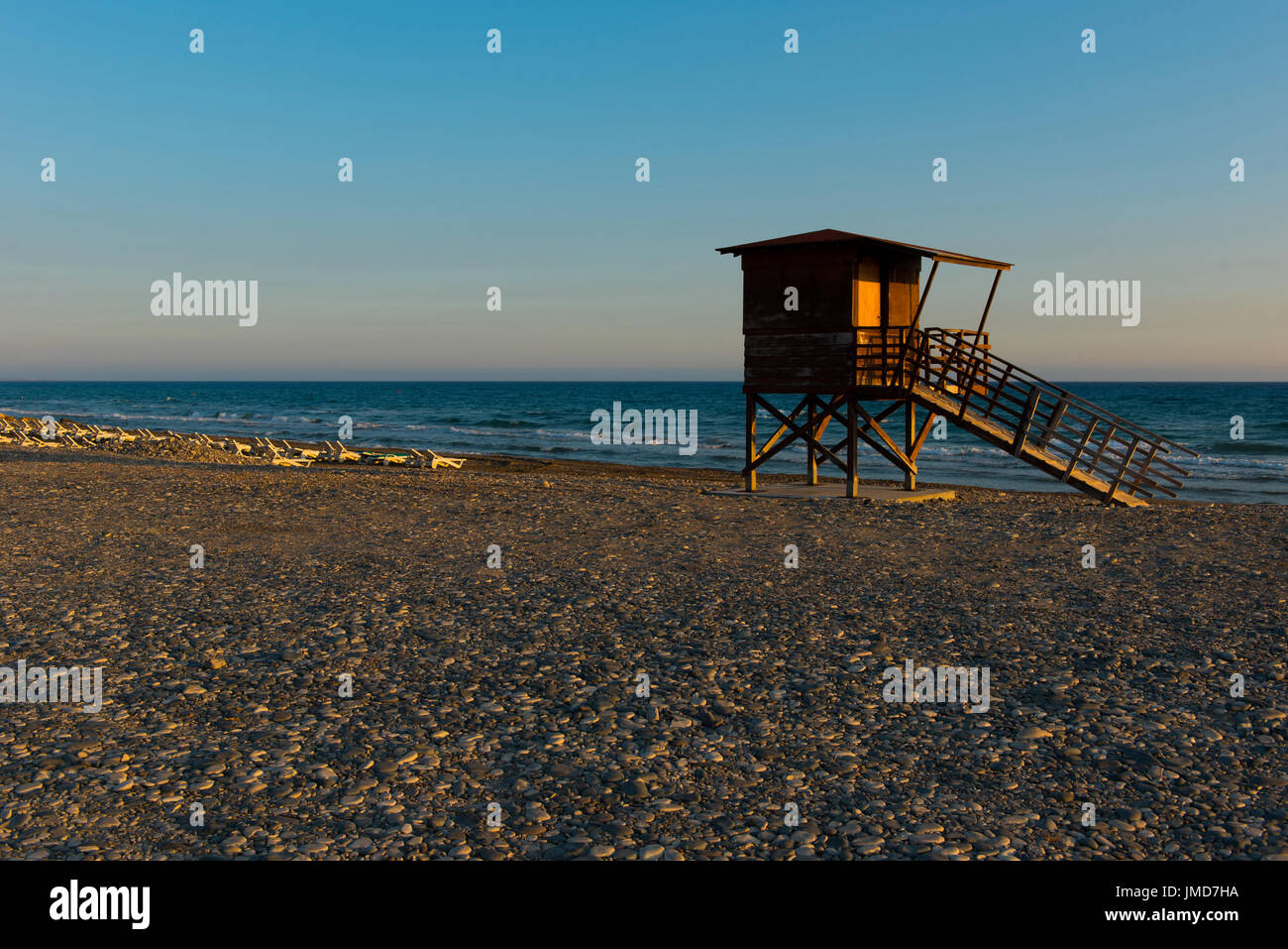 Baywatch tower on the beach. Lifeguard tower in the sunset Stock Photo ...